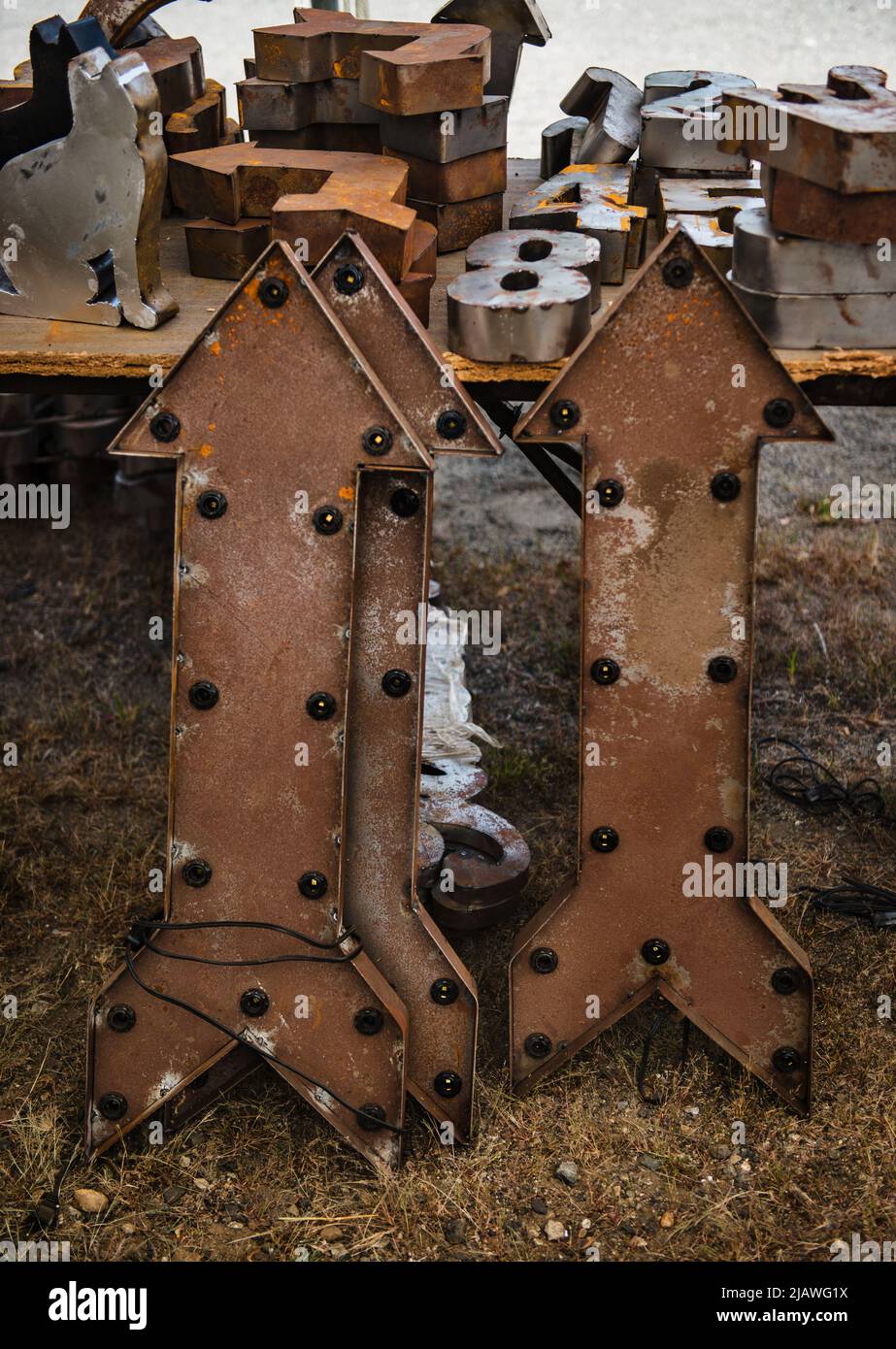 Metal arrow signs for sale at the Brimfield flea market, Massachusetts ...