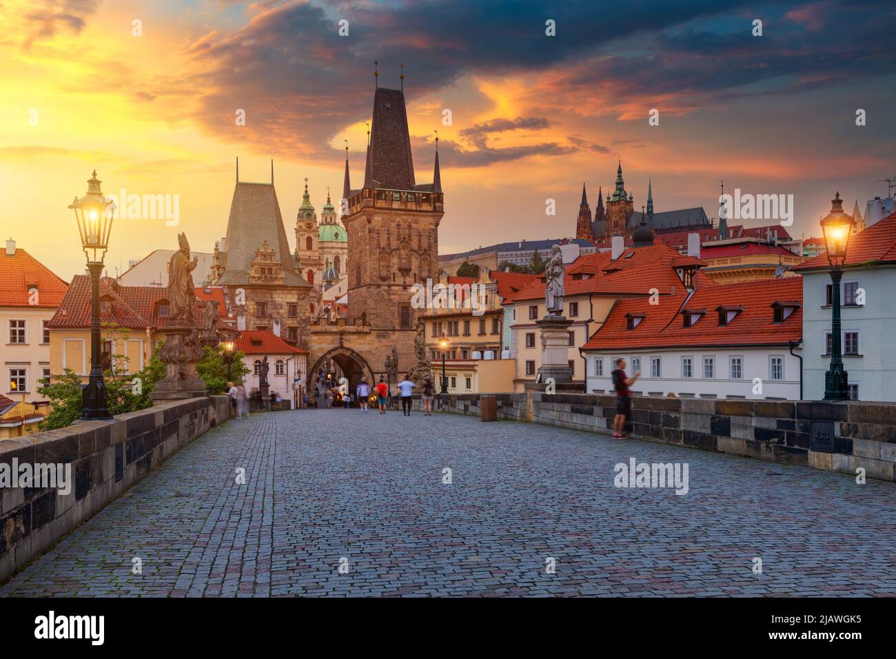 Charles Bridge in Prague at sunset. Prague, Czech Republic. Charles Bridge (Karluv Most) and Old ...