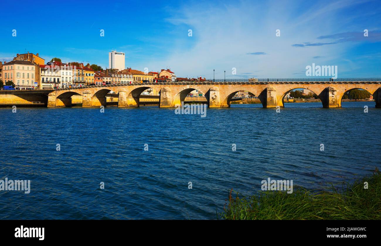 Old arch bridge in Macon, France Stock Photo - Alamy