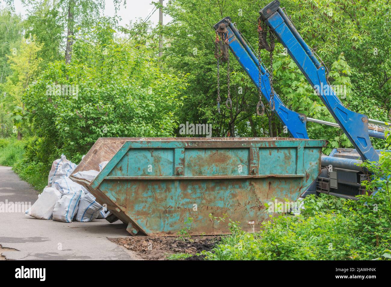 Construction waste in the bags before loading Stock Photo - Alamy