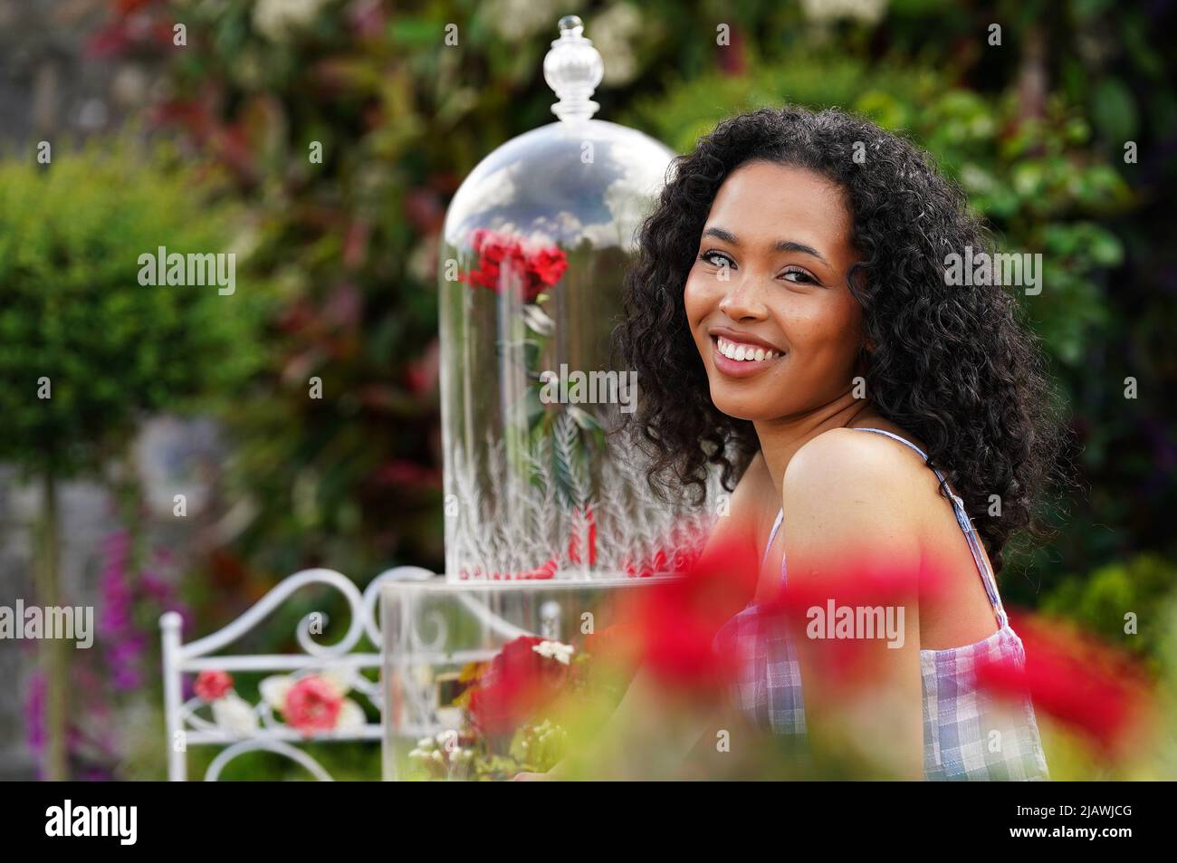 Model Marwa Noelle Ali sits in a garden entitled 'Beauty & The Beast ...