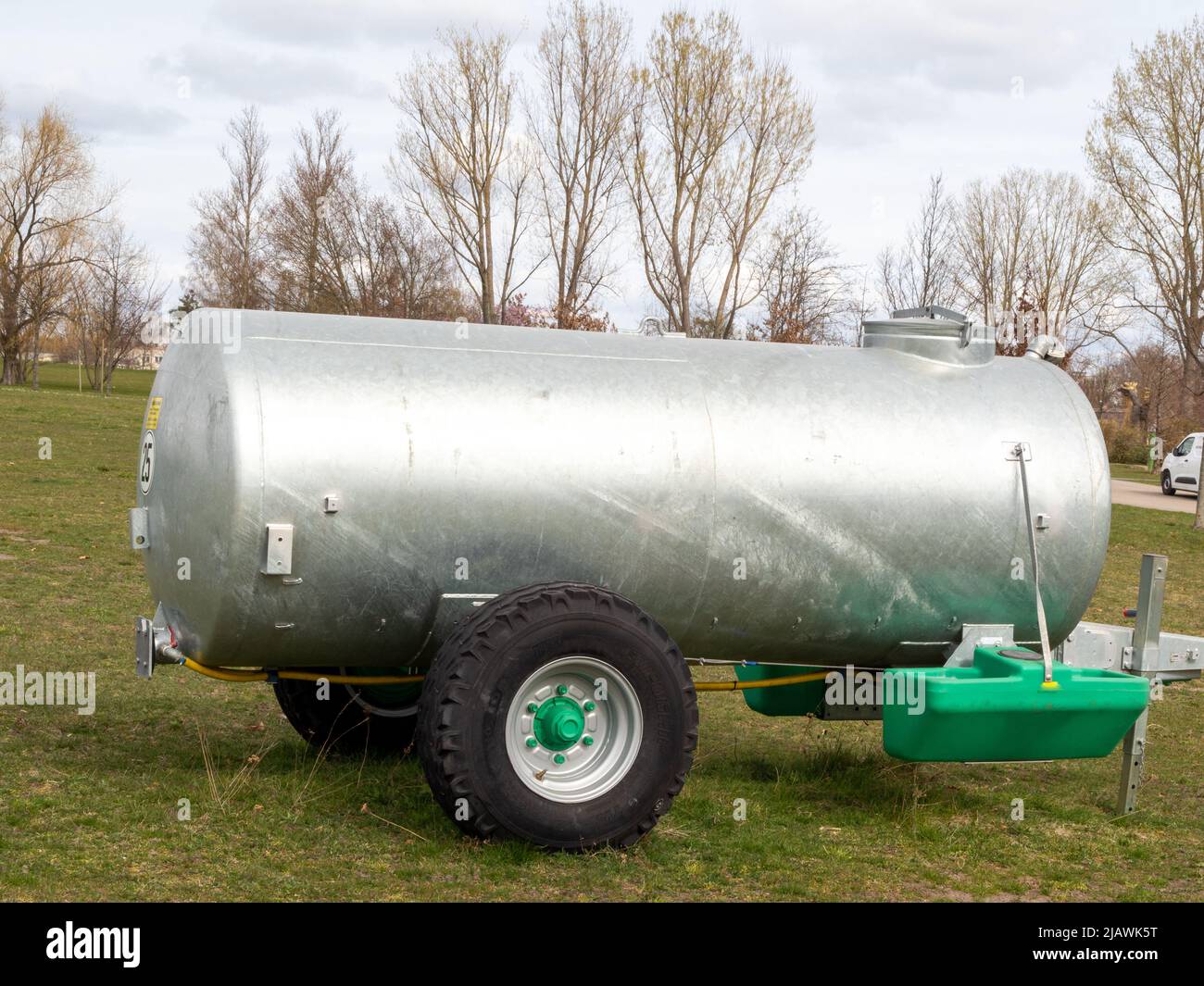 Barrel for watering cattle. Watering place for cattle Stock Photo - Alamy