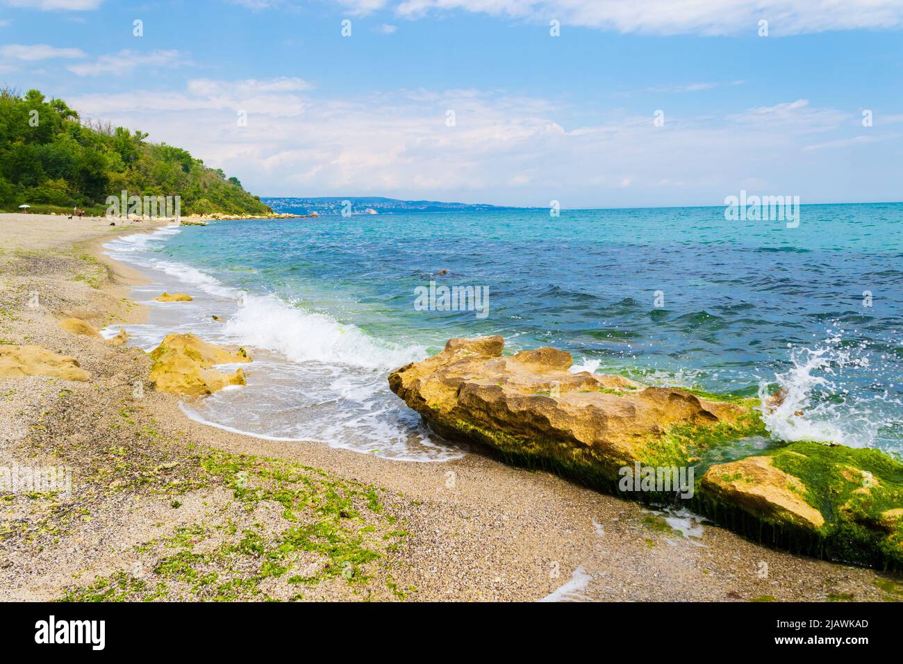 Beautiful beach and people with Stand-up-paddles off shore Galata cape ...
