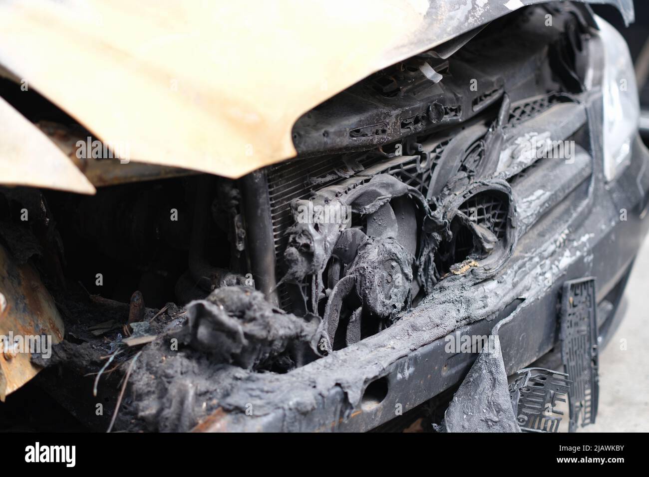 Broken and completely burned out car closeup Stock Photo - Alamy