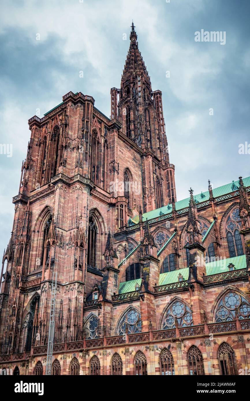 Huge tower and elegant exterior architecture of Notre dam of Strasbourg ...