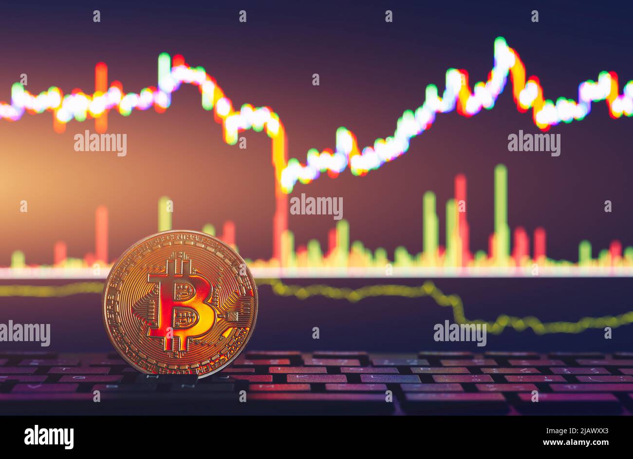 Bitcoin gold coin and defocused chart background. Virtual ...