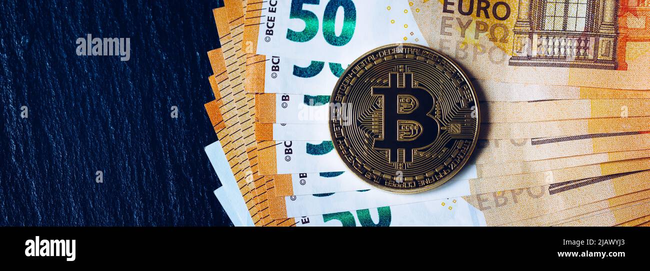 Golden bitcoin over Euro money. Bitcoin cryptocurrency. Crypto currency ...