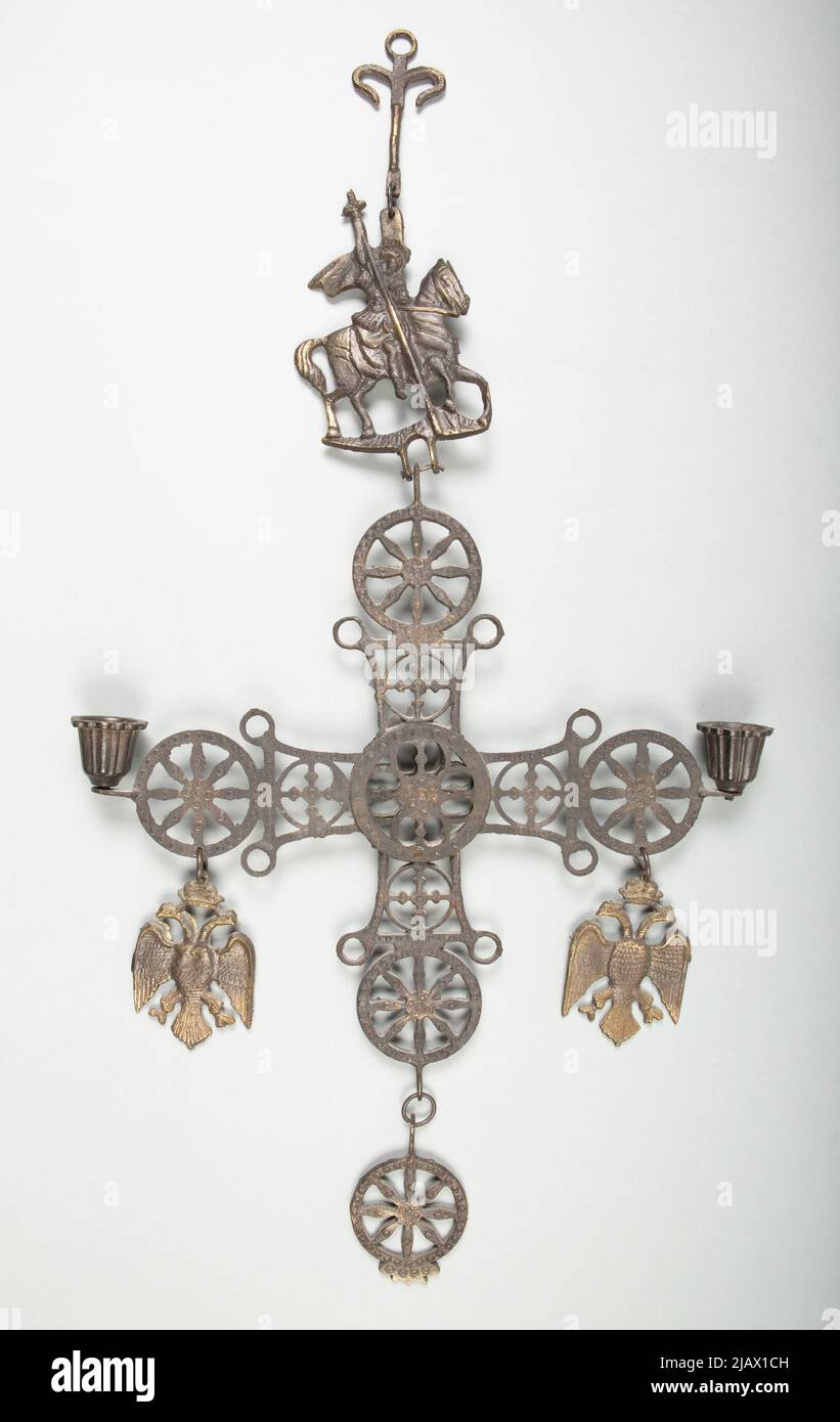 A Byzantine Cross with candle holders and the motif of St. Jerzy ...