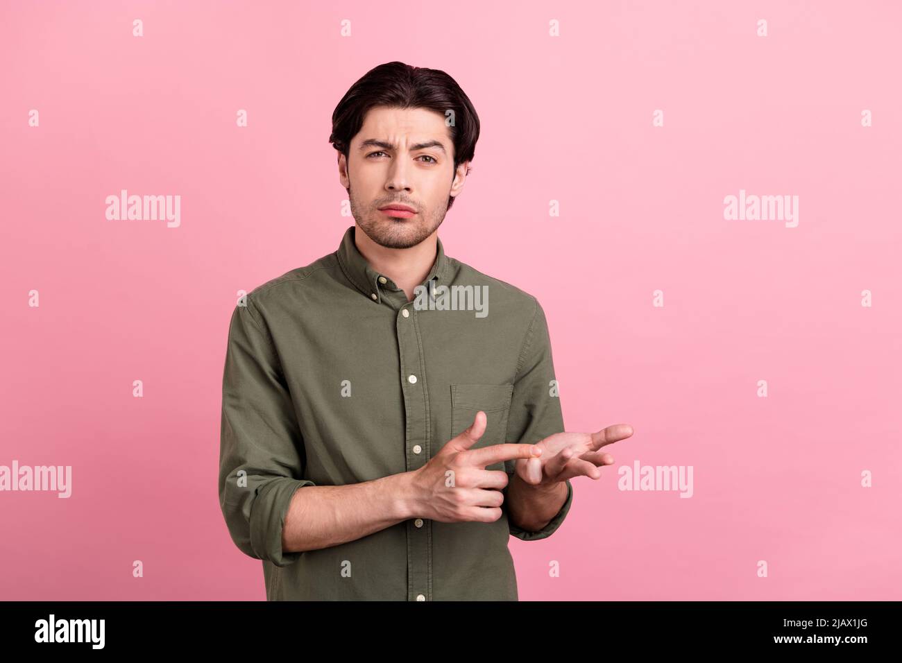 Photo of unhappy young upset angry man count fingers bad mood offended ...