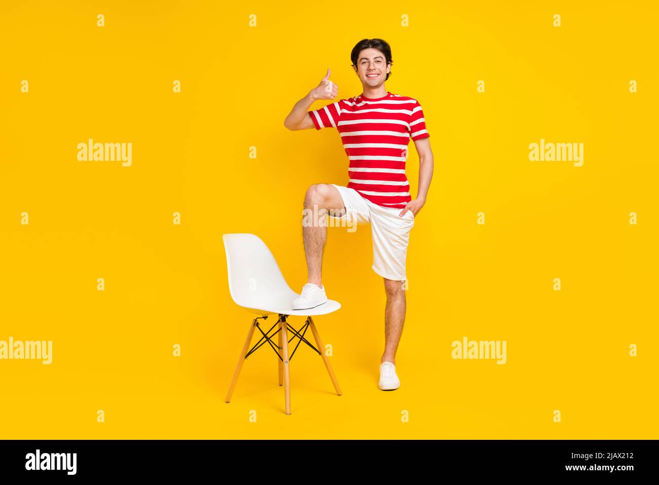 Full body photo of positive young happy man hold hand thumb up ...