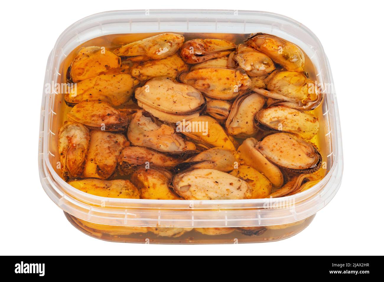 Marinated mussels in a jar, isolated on a white background. File ...