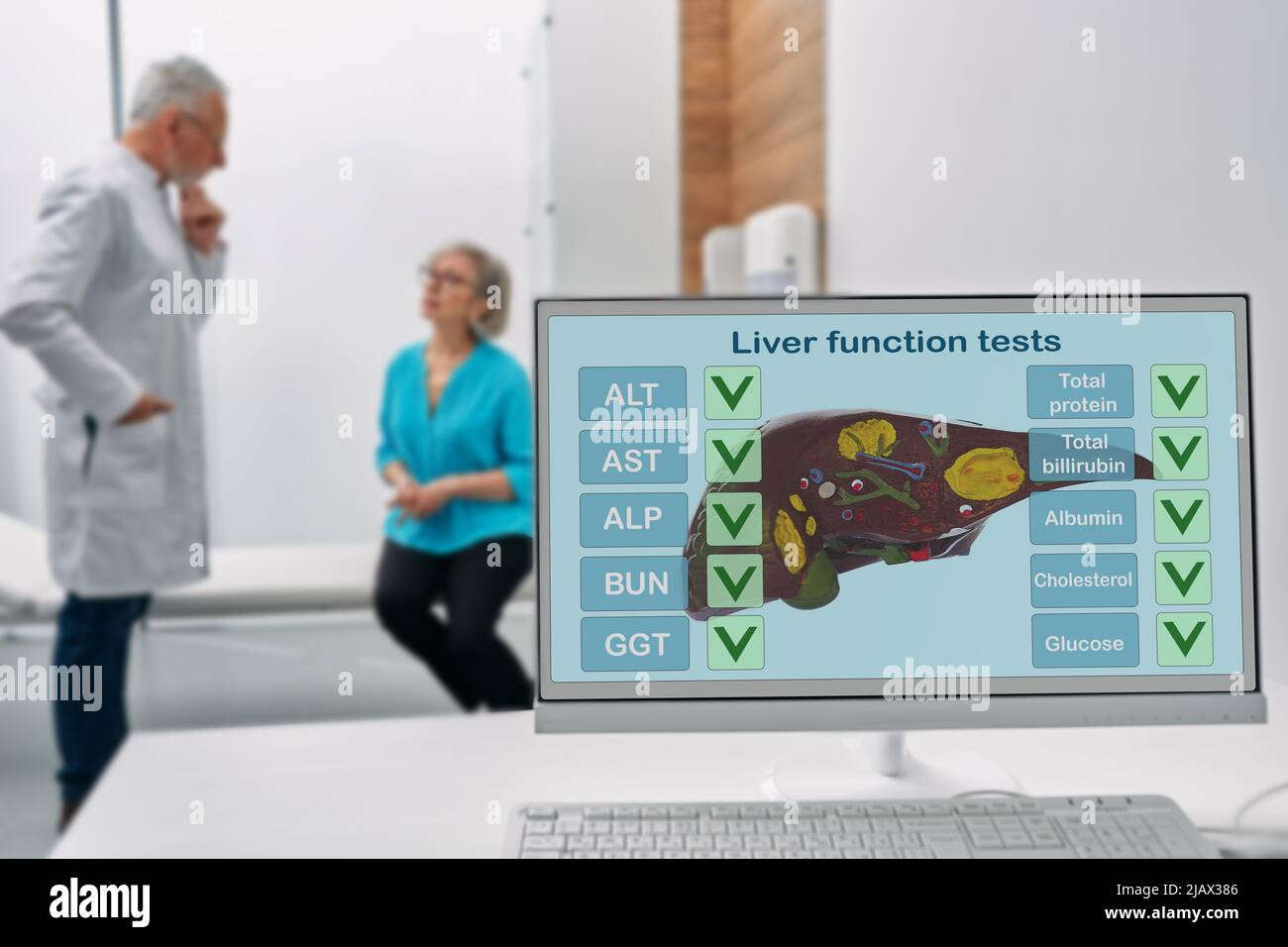 Human liver function tests and blood tests on monitor on doctor's table ...