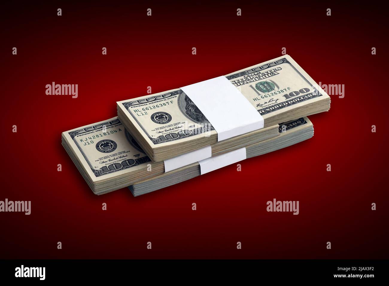 Bundle of US dollar bills on crimson red background. Pack of american ...