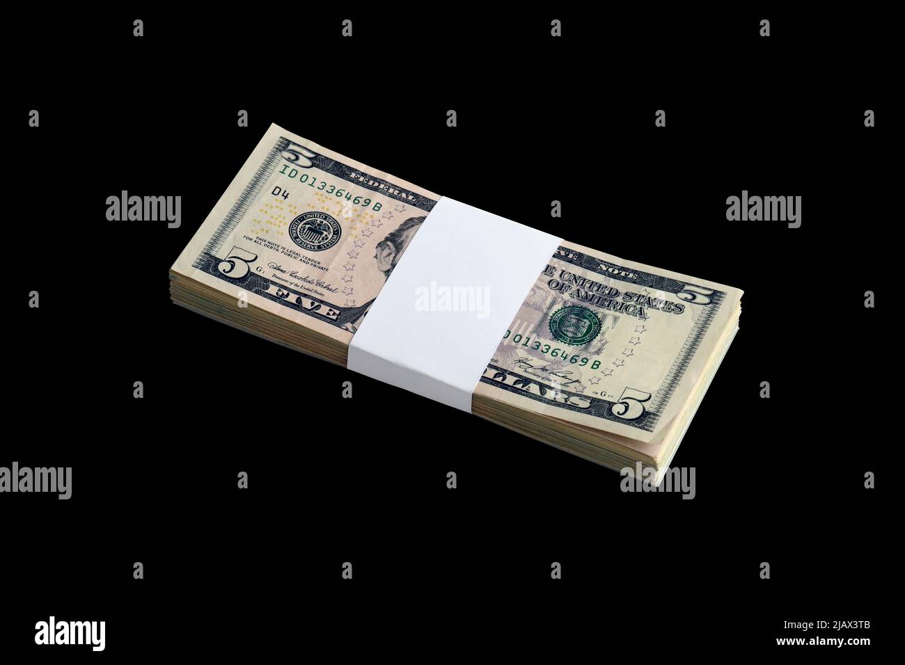 Bundle of US dollar bills isolated on black. Pack of american money with high resolution on ...