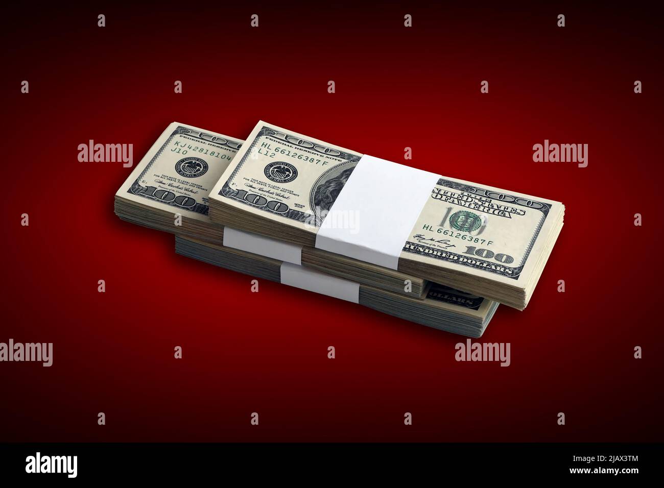 Bundle of US dollar bills on crimson red background. Pack of american ...