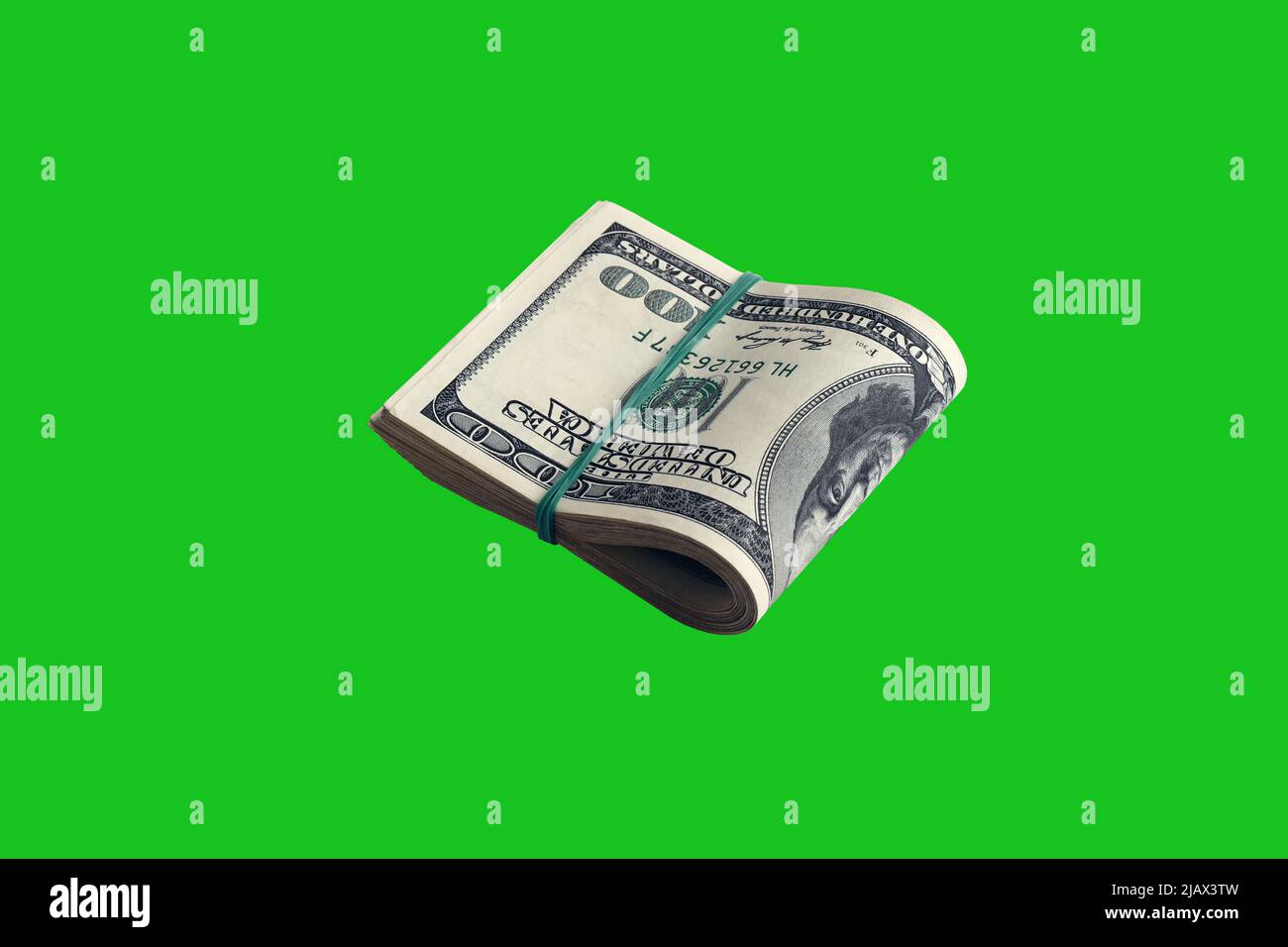 Bundle of US dollar bills isolated on chroma keyer green. Pack of ...