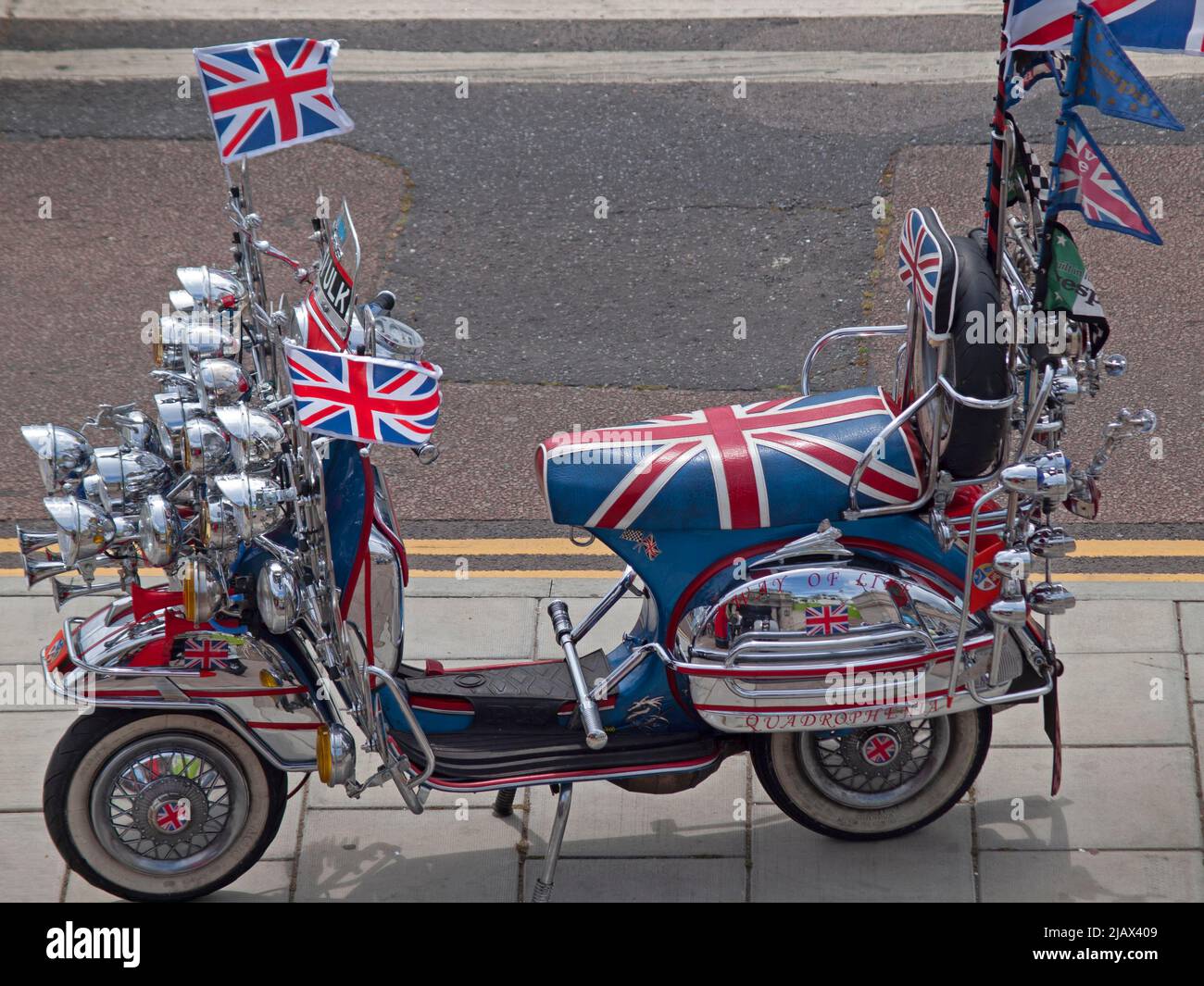 A Mod scooter parked up on the Brighton seafront, England Stock Photo ...