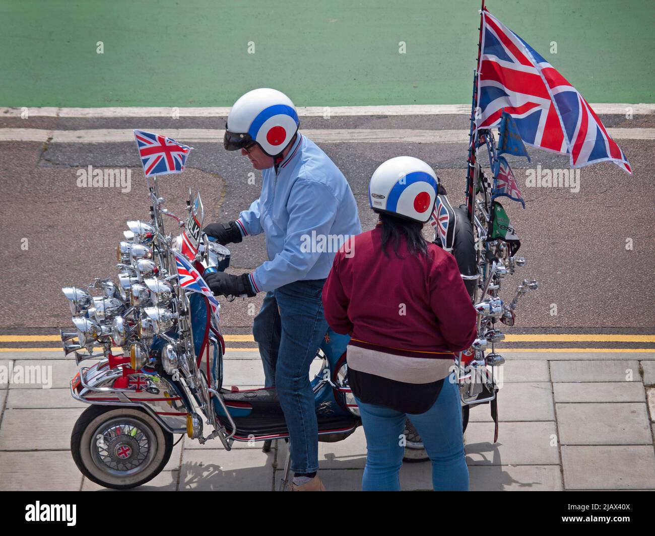 A Mod scooter parked up on the Brighton seafront, England Stock Photo ...