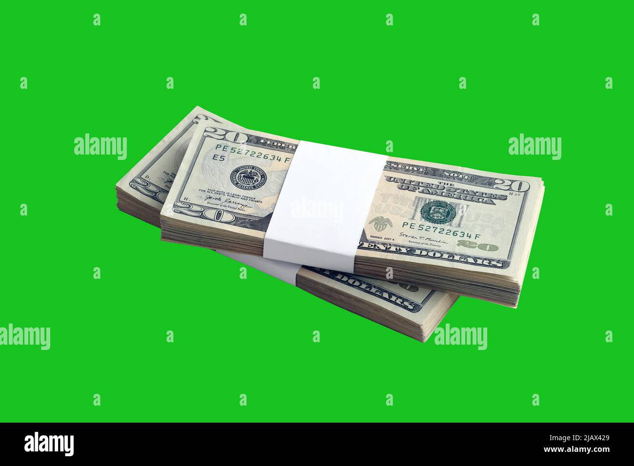 Bundle of US dollar bills isolated on chroma keyer green. Pack of ... Bundle of US dollar bills isolated on chroma keyer green. Pack of ...