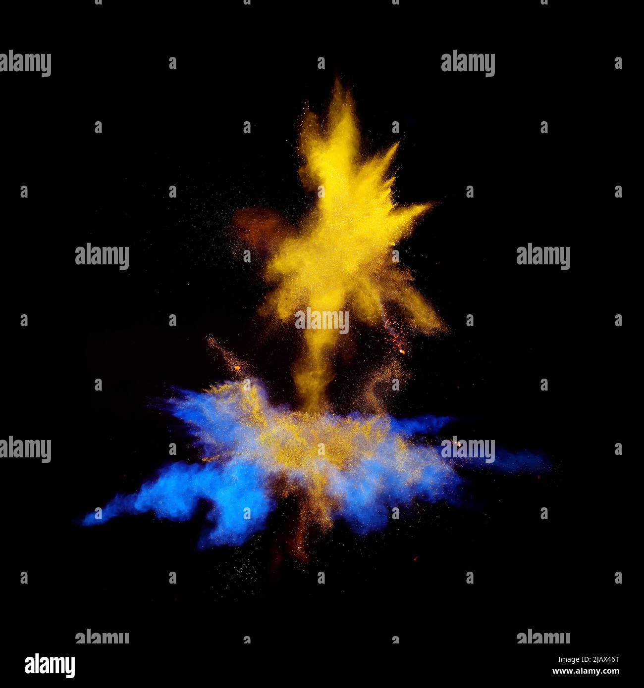 A bizarre form of golden glitter and blue powder paint explode in front ...