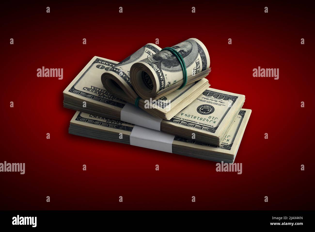 Bundle of US dollar bills on crimson red background. Pack of american ...