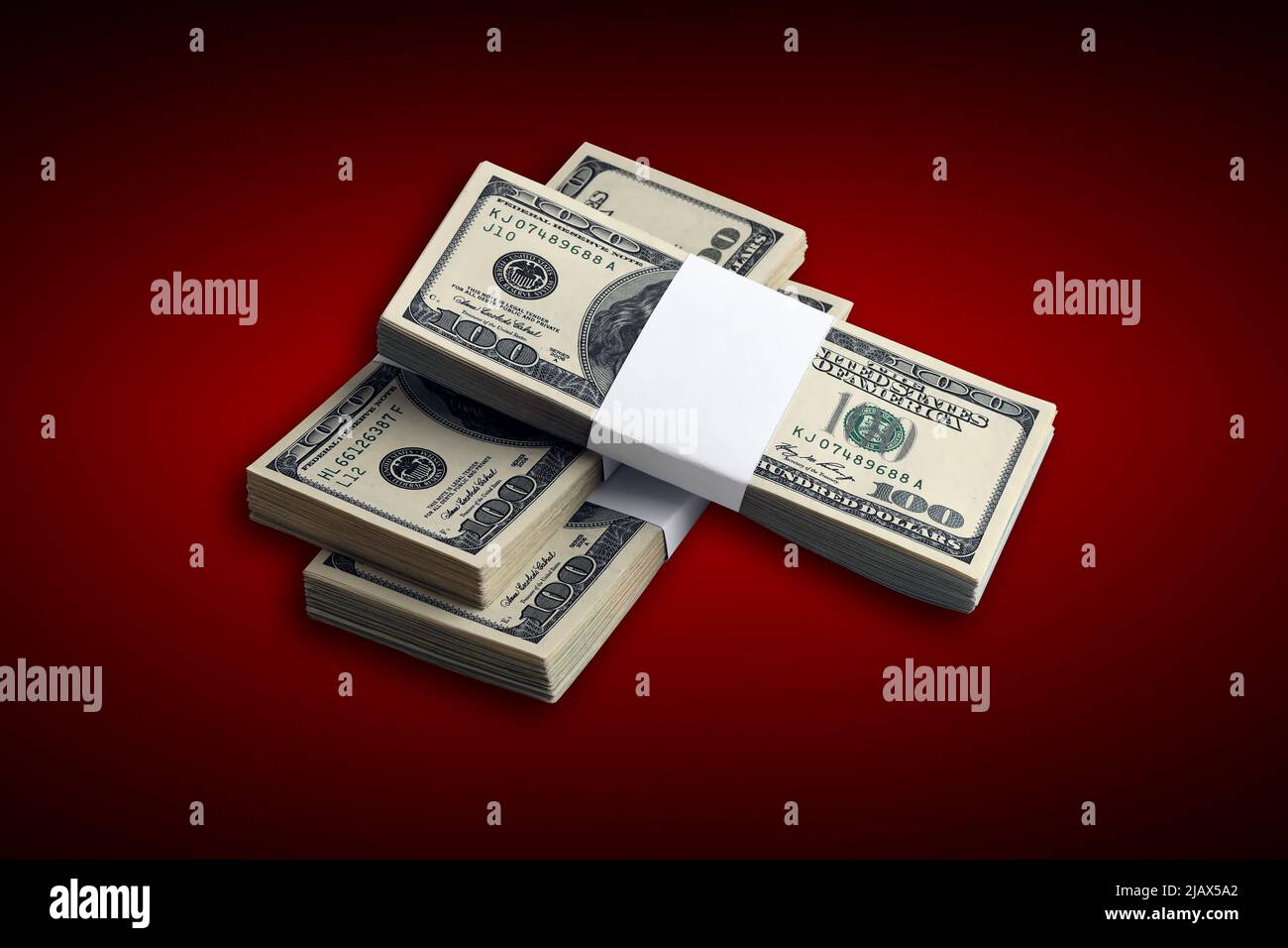 Bundle of US dollar bills on crimson red background. Pack of american ...