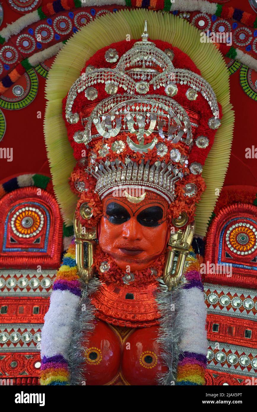 Theyyam is a famous ritual art form in kerala with face painted using ...