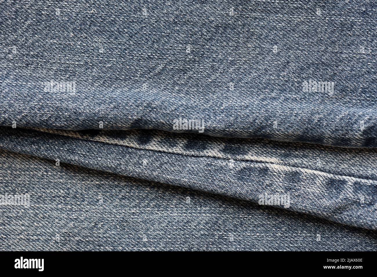Detailed abstract texture of dark blue denim cloth. Background image of ...