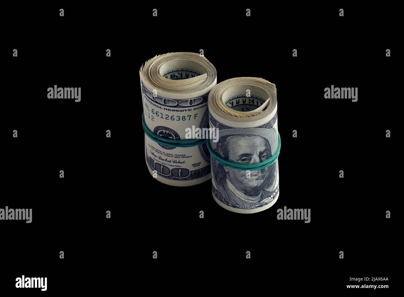 Bundle of US dollar bills isolated on black. Pack of american money ...