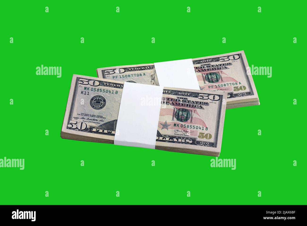 Bundle of US dollar bills isolated on chroma keyer green. Pack of ...