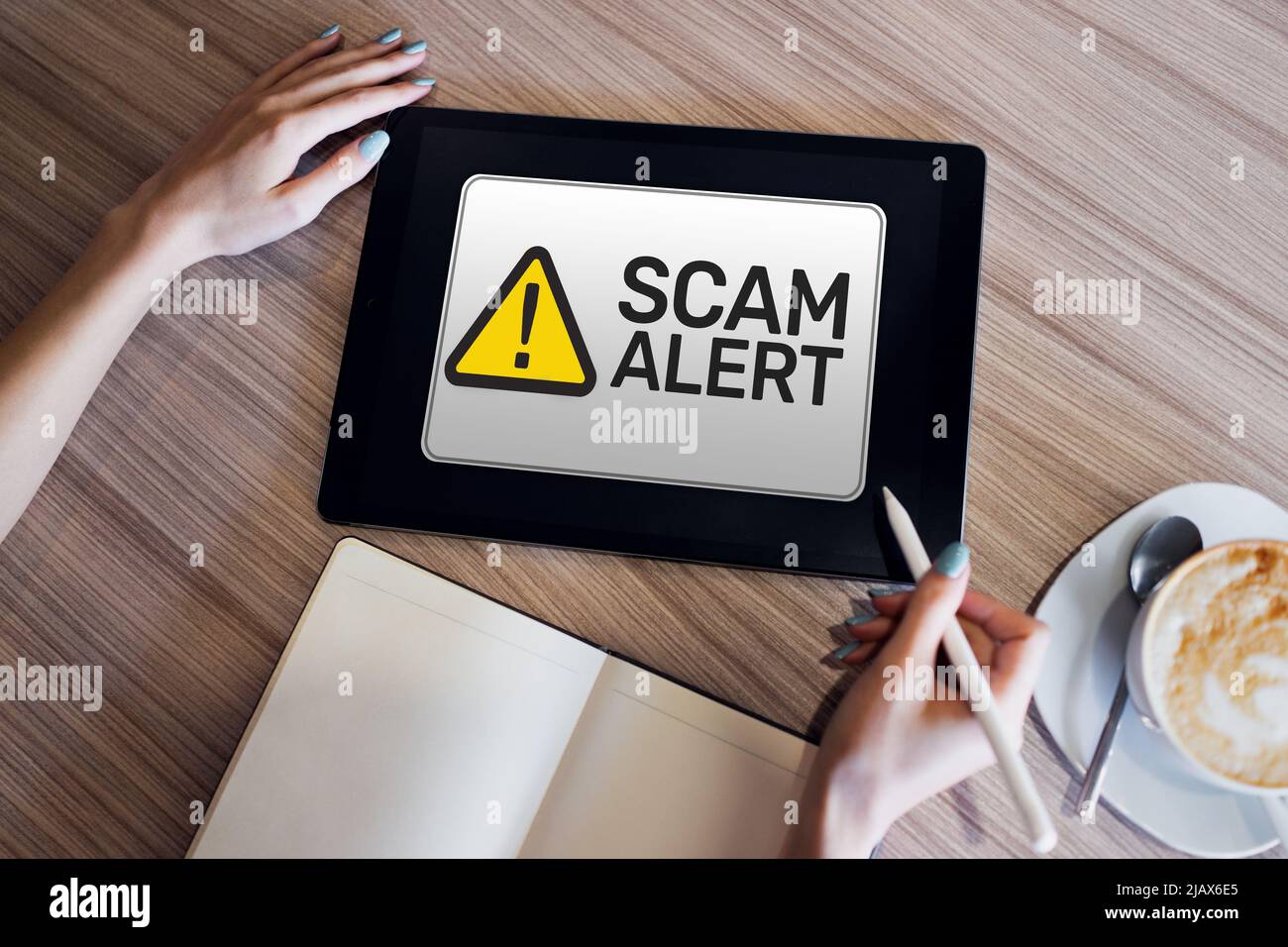 Scam alert detecting warning. Notification on device screen Stock Photo ...