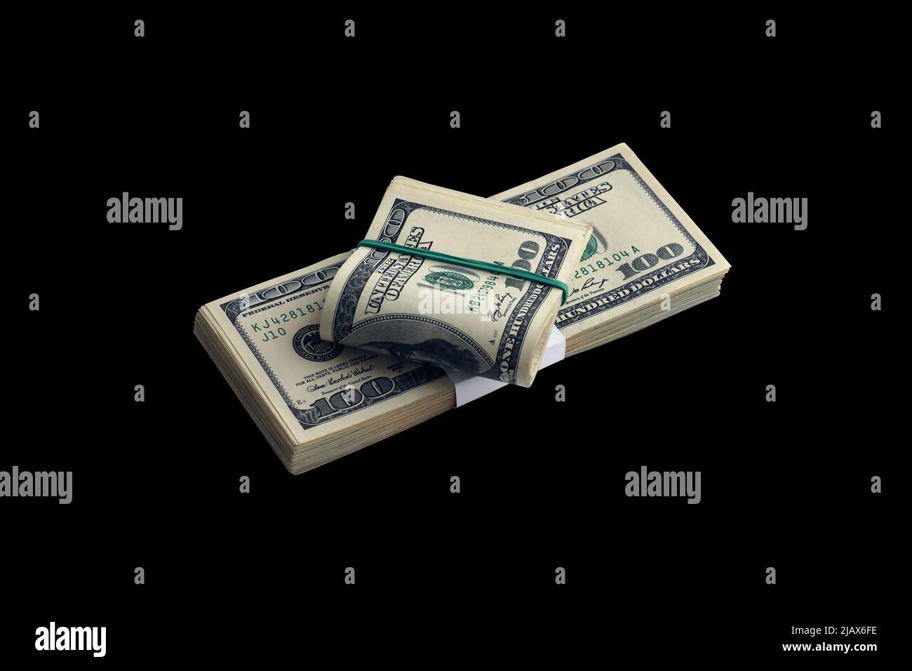 Bundle of US dollar bills isolated on black. Pack of american money with high resolution on ...