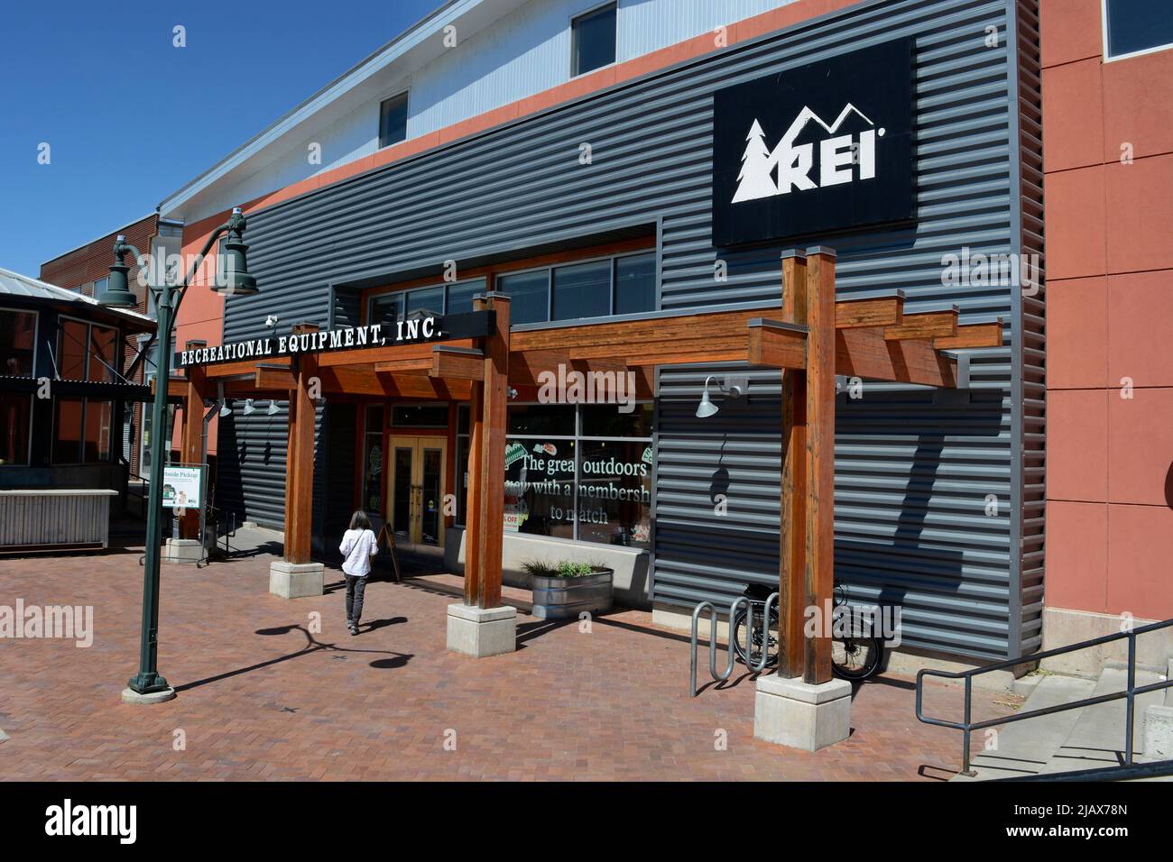 A customer enters an REI (Recreational Equipment, Inc.) store in Santa ...