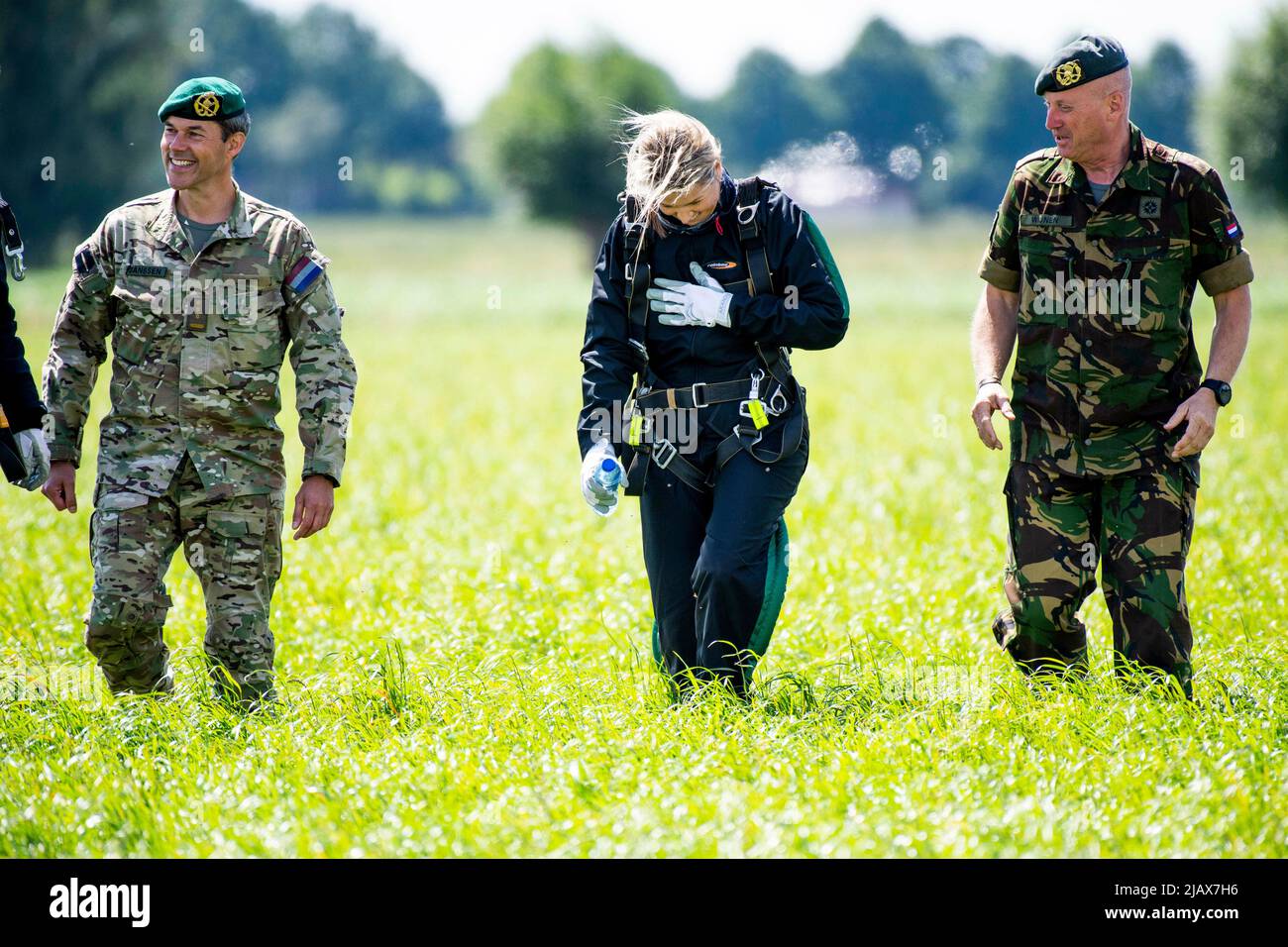 Dutch Queen Maxima during a tandem parachute jump with paratroopers at ...