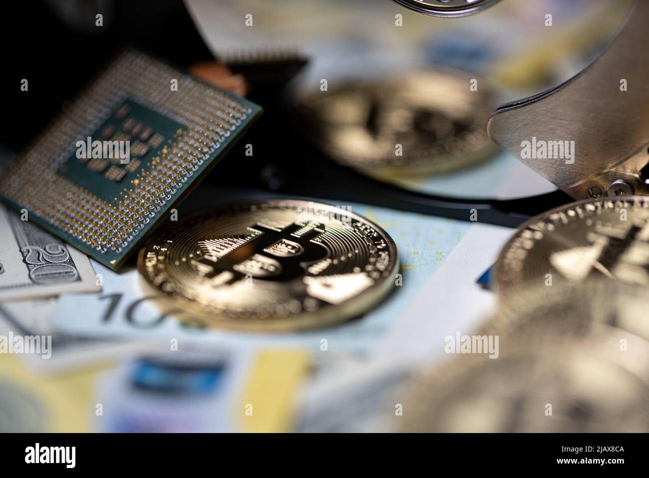 Crypto mining concept, bitcoin reflecting in hard drive disk next to US ...