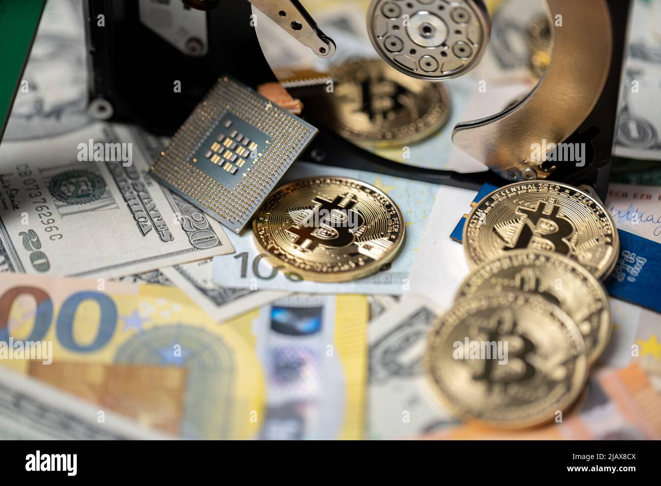 Crypto mining concept, bitcoin reflecting in hard drive disk next to US ...