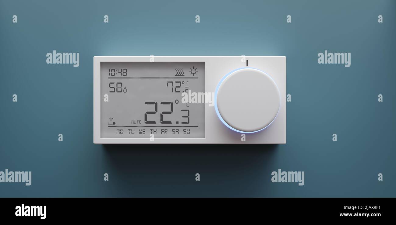 Home heating temperature control device Digital thermostat on blue wall ...
