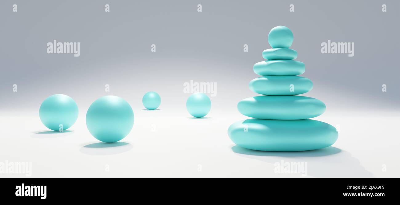 Zen stones pyramid stack and round sea pebbles on white background ...