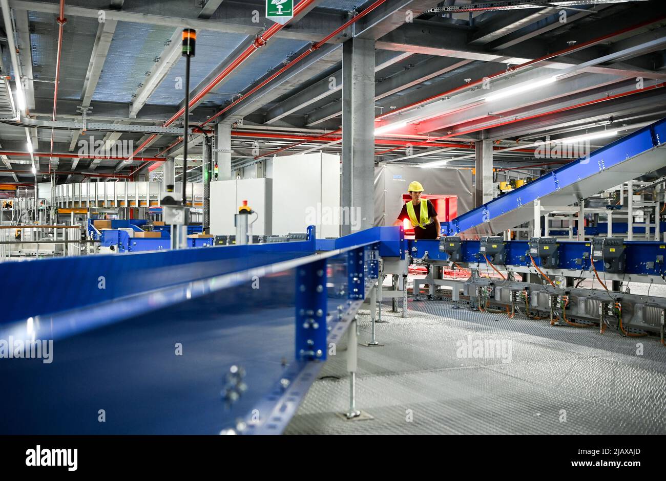 Ludwigsfelde, Germany. 01st June, 2022. Parcels are scanned, sorted and ...