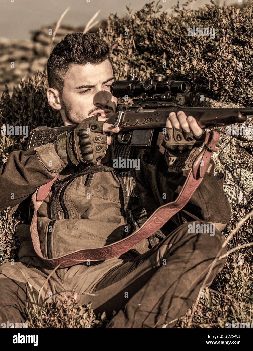Hunt hunting rifle. Hunter man. Hunting period. Male with a gun. Close ...