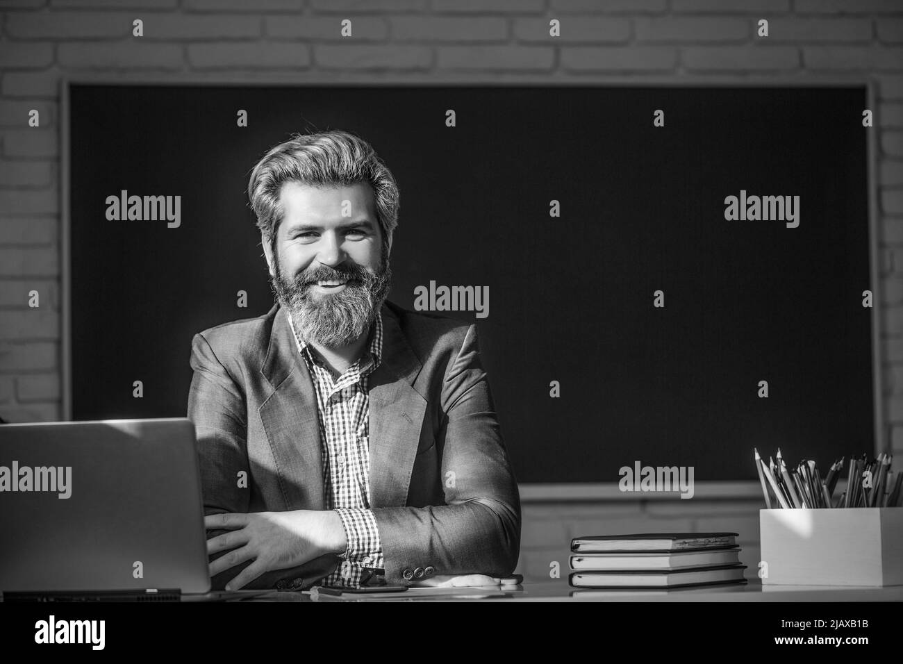 Teacher blackboard laptop Black and White Stock Photos & Images - Alamy