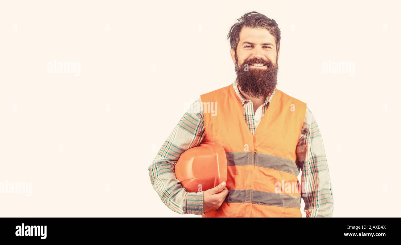 Builder in hard hat, foreman or repairman in the helmet. Bearded man ...