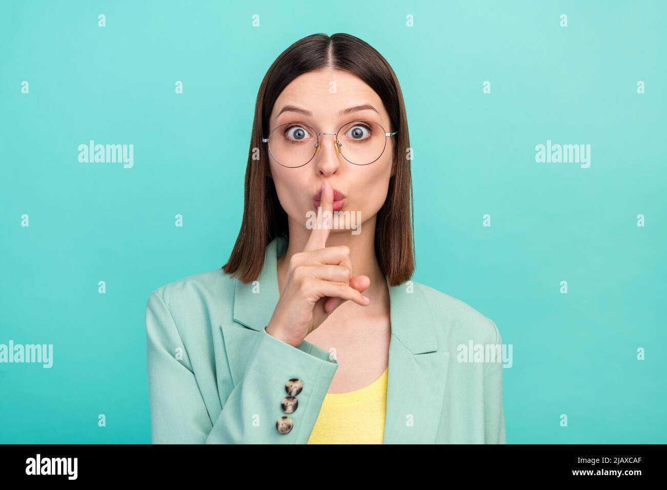 Photo of impressed milllennial brunette lady finger lips wear eyewear ...