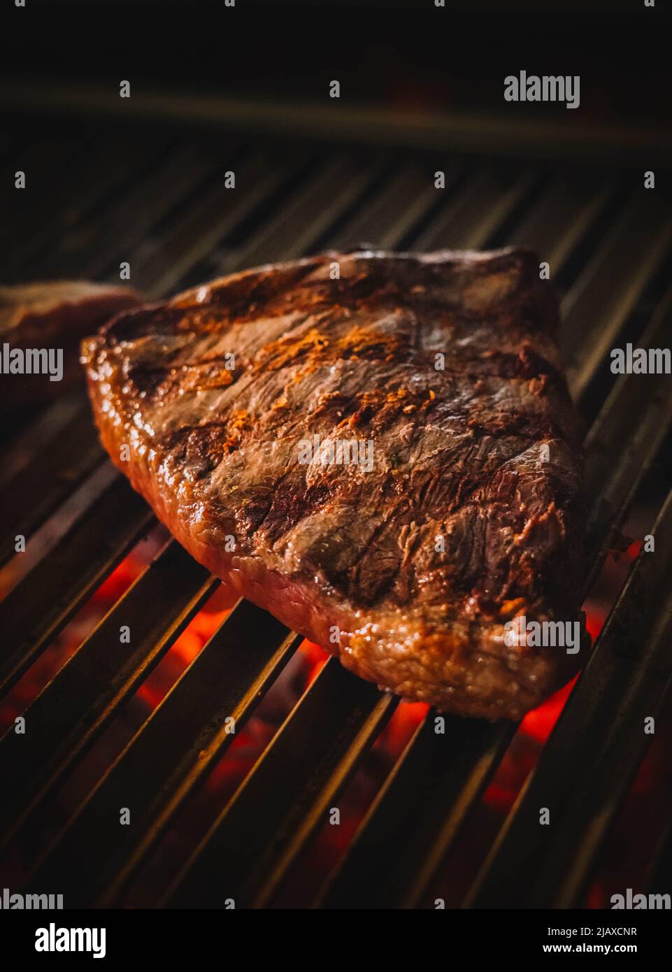 Nice chunks of beef on a charcoal grill Stock Photo - Alamy