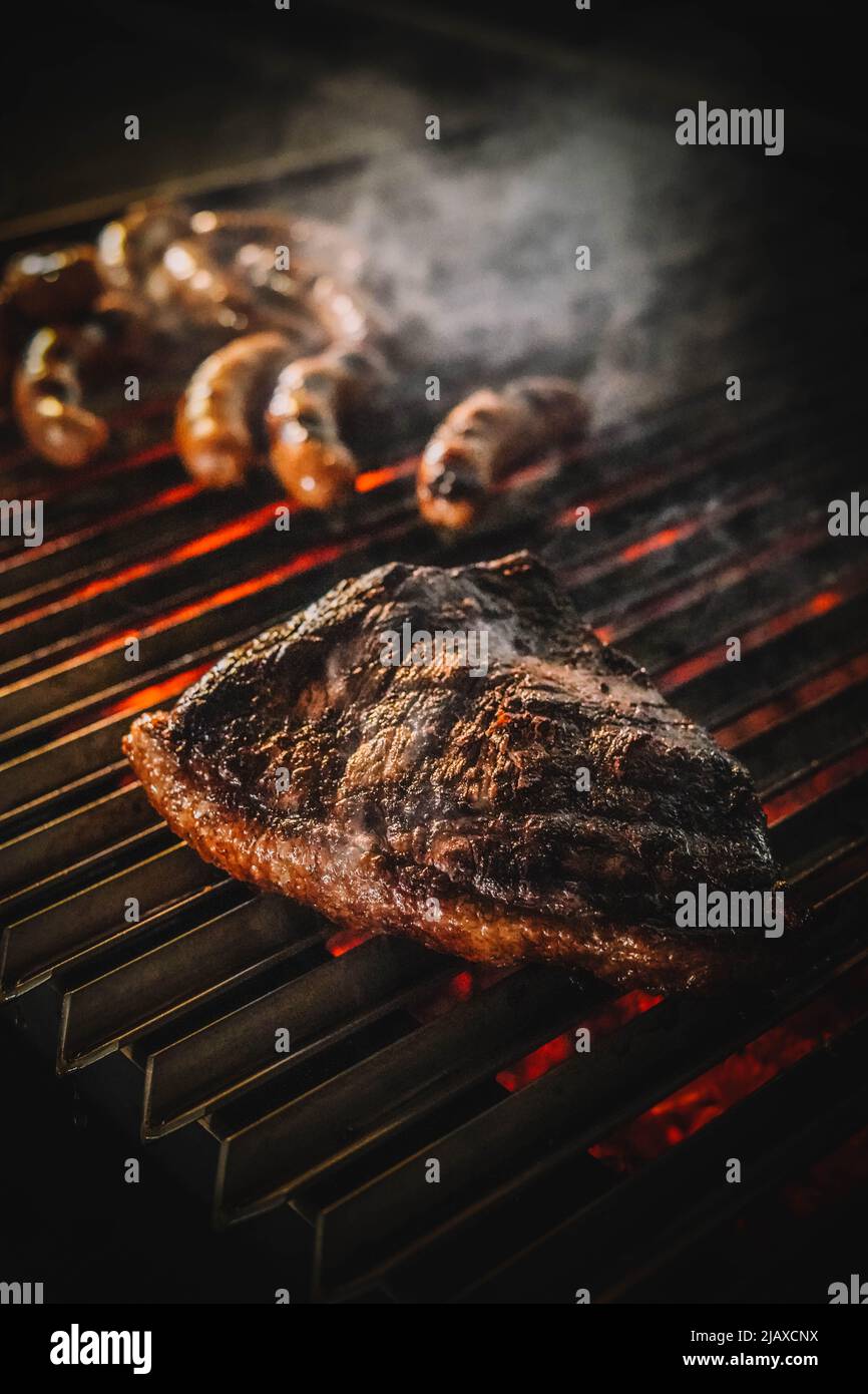 Nice chunks of beef on a charcoal grill Stock Photo - Alamy