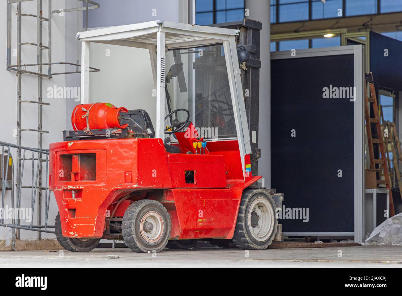 Small Red Gas Powered Forklift Truck in Hall Stock Photo - Alamy