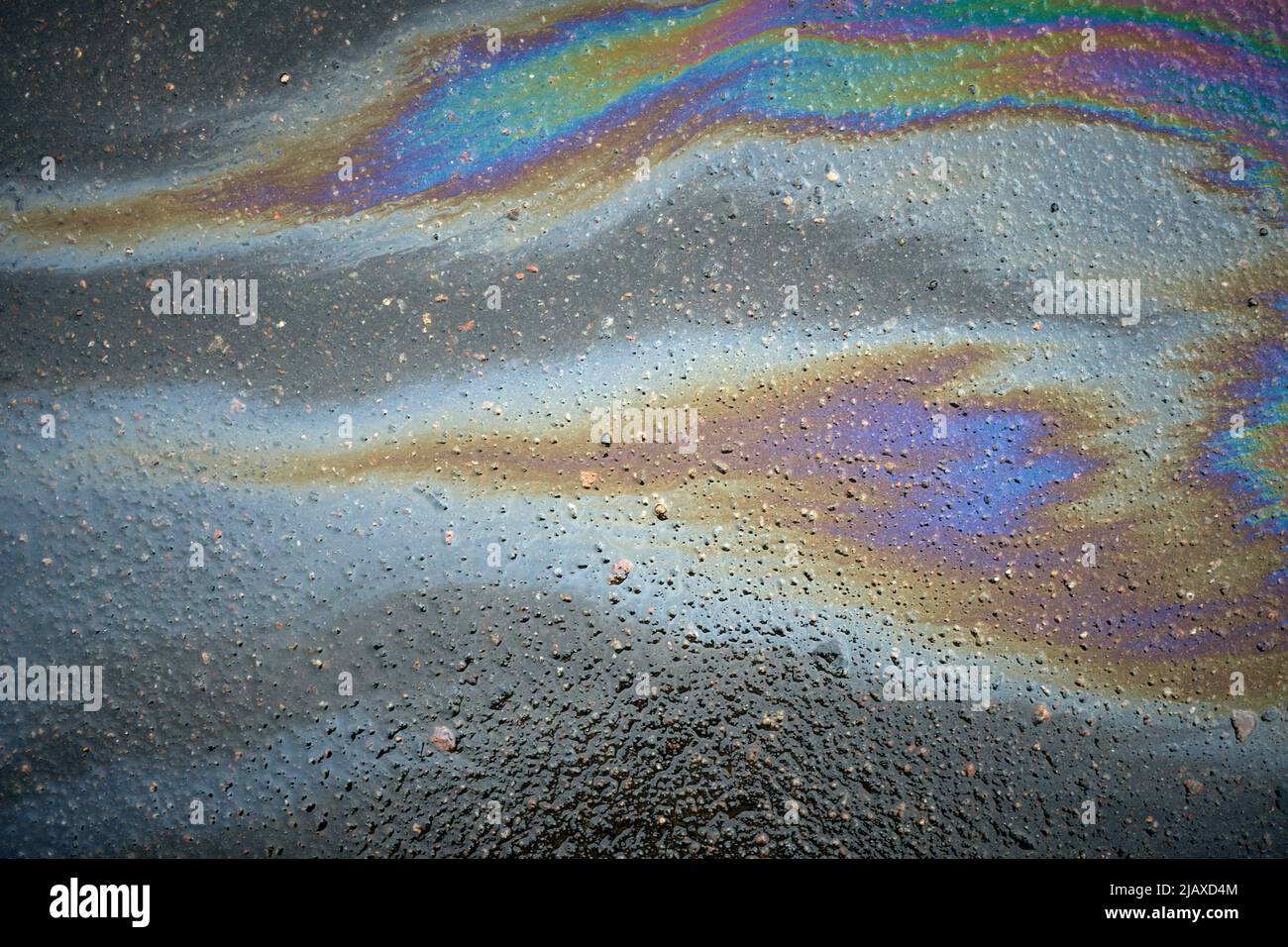 Oil on wet road rainbow hi-res stock photography and images - Alamy