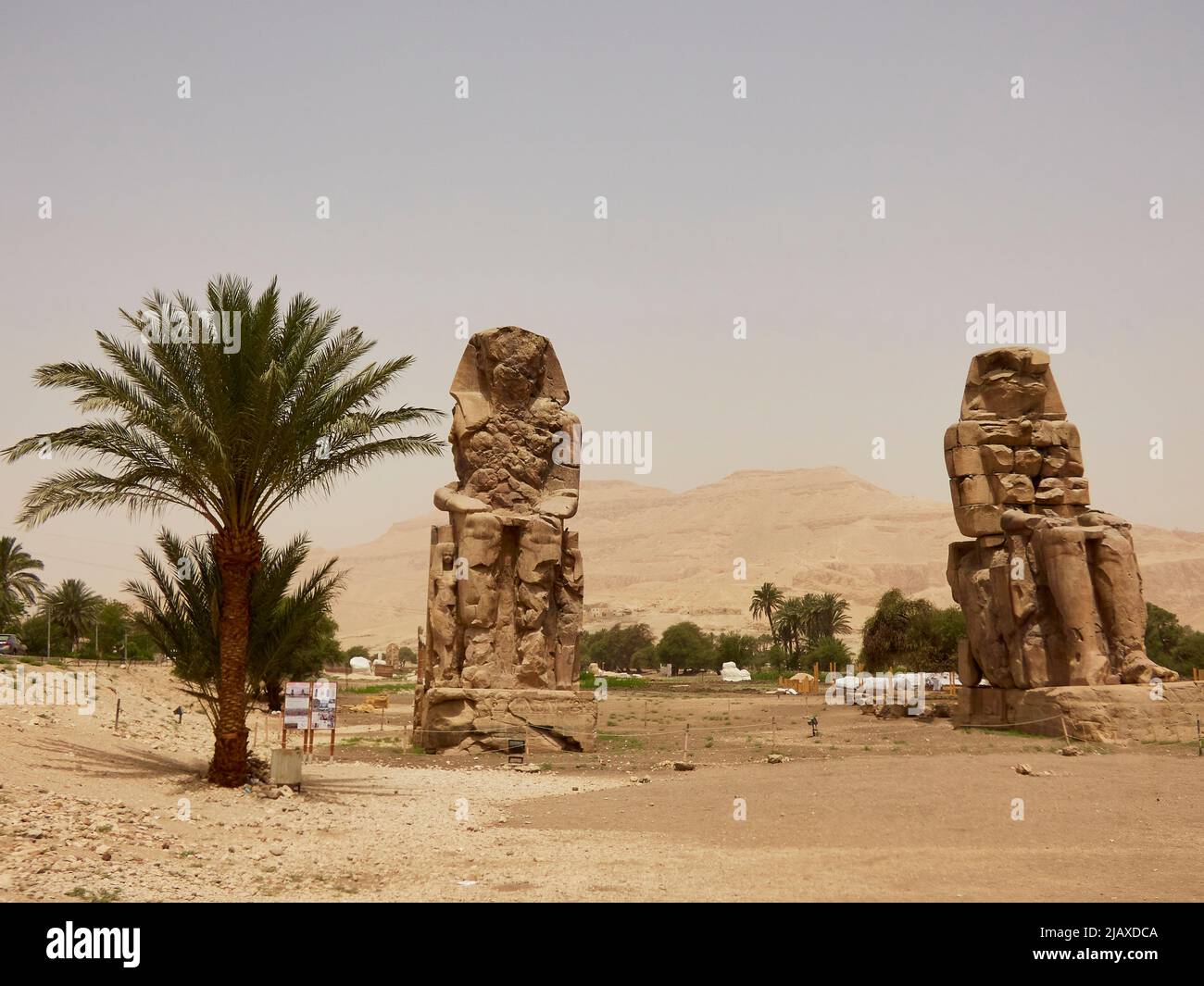 The Colossi of Memnon, two stone massive statues Stock Photo - Alamy