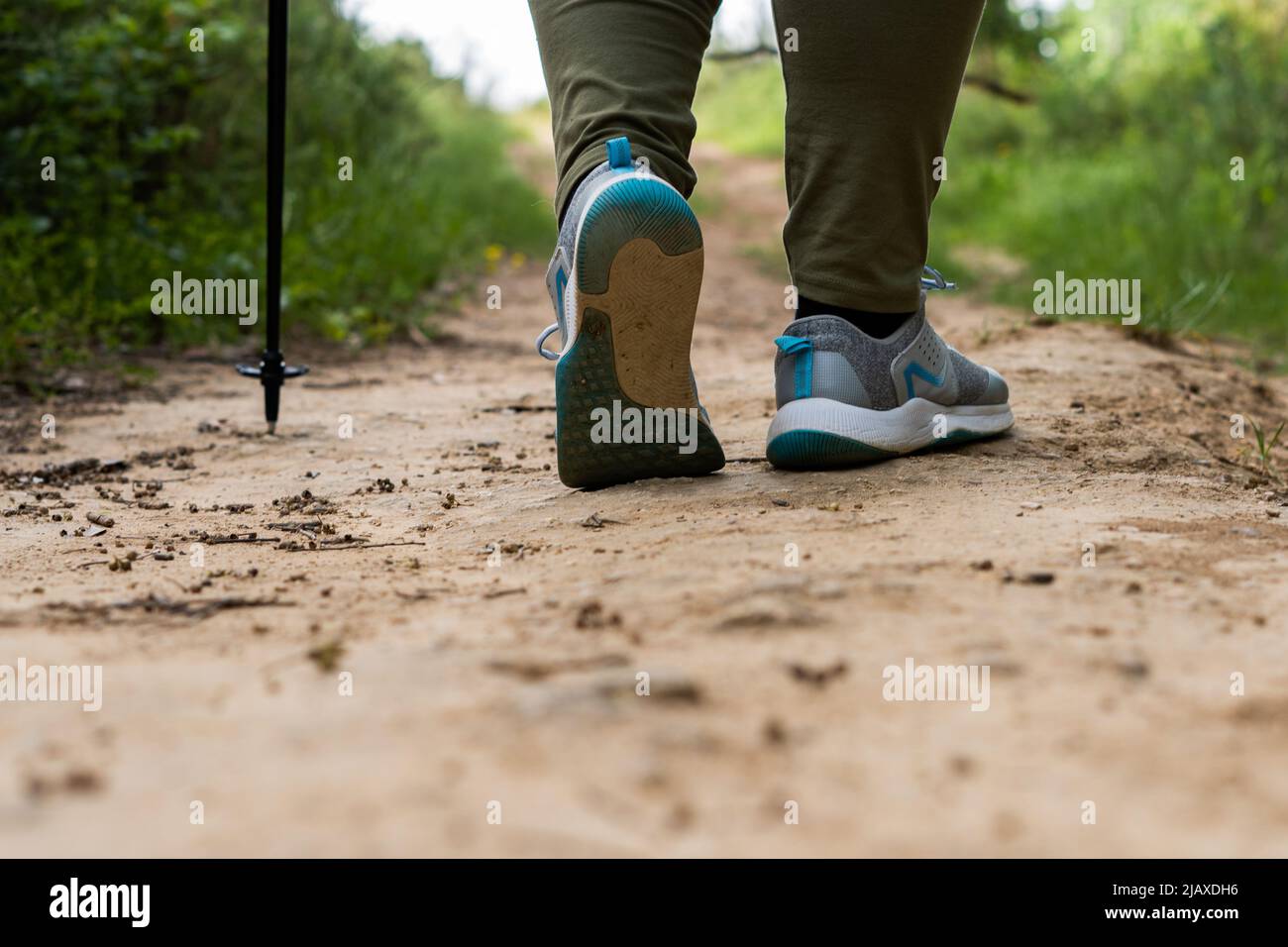 Woman running with baby rear view hi-res stock photography and images ...