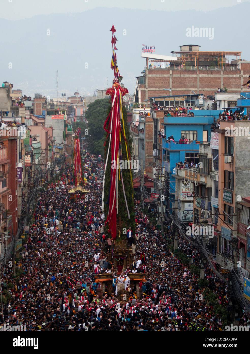Lalitpur, Nepal. 1st June, 2022. Devotees pull the chariot of Rato ...
